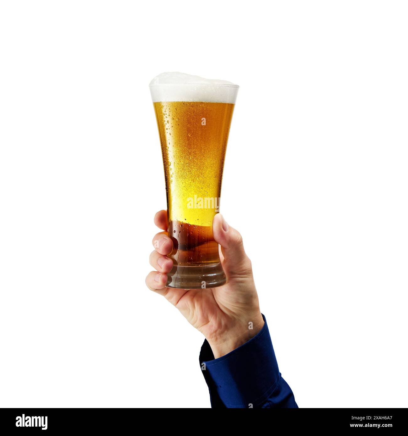 Refreshing Brew. Male hand holding glass of light, refreshing foamy ...