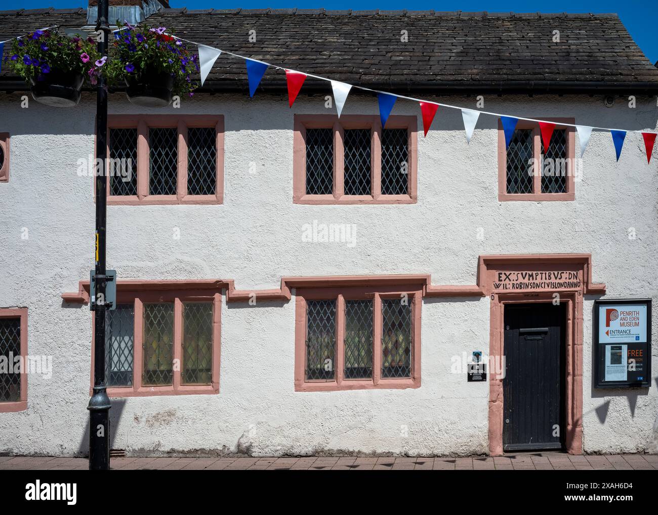 The inscribed lintel above the old entrance to a 17th century school in ...