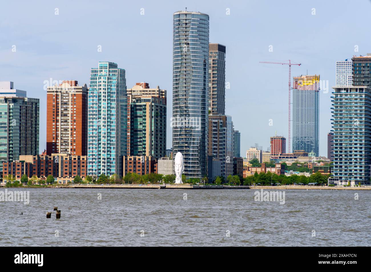 View of Jersey City waterfront and Water's Soul sculpture along the ...