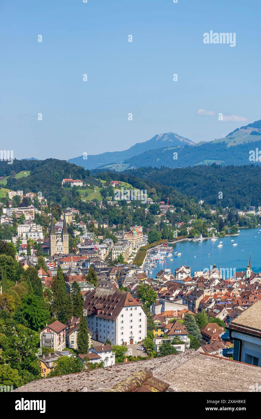 Aerial view of historic cityscape with hills, alps and the lake of ...