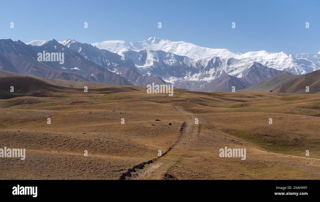 Scenic summer high altitude landscape view of Lenin Peak aka Ibn Sina ...