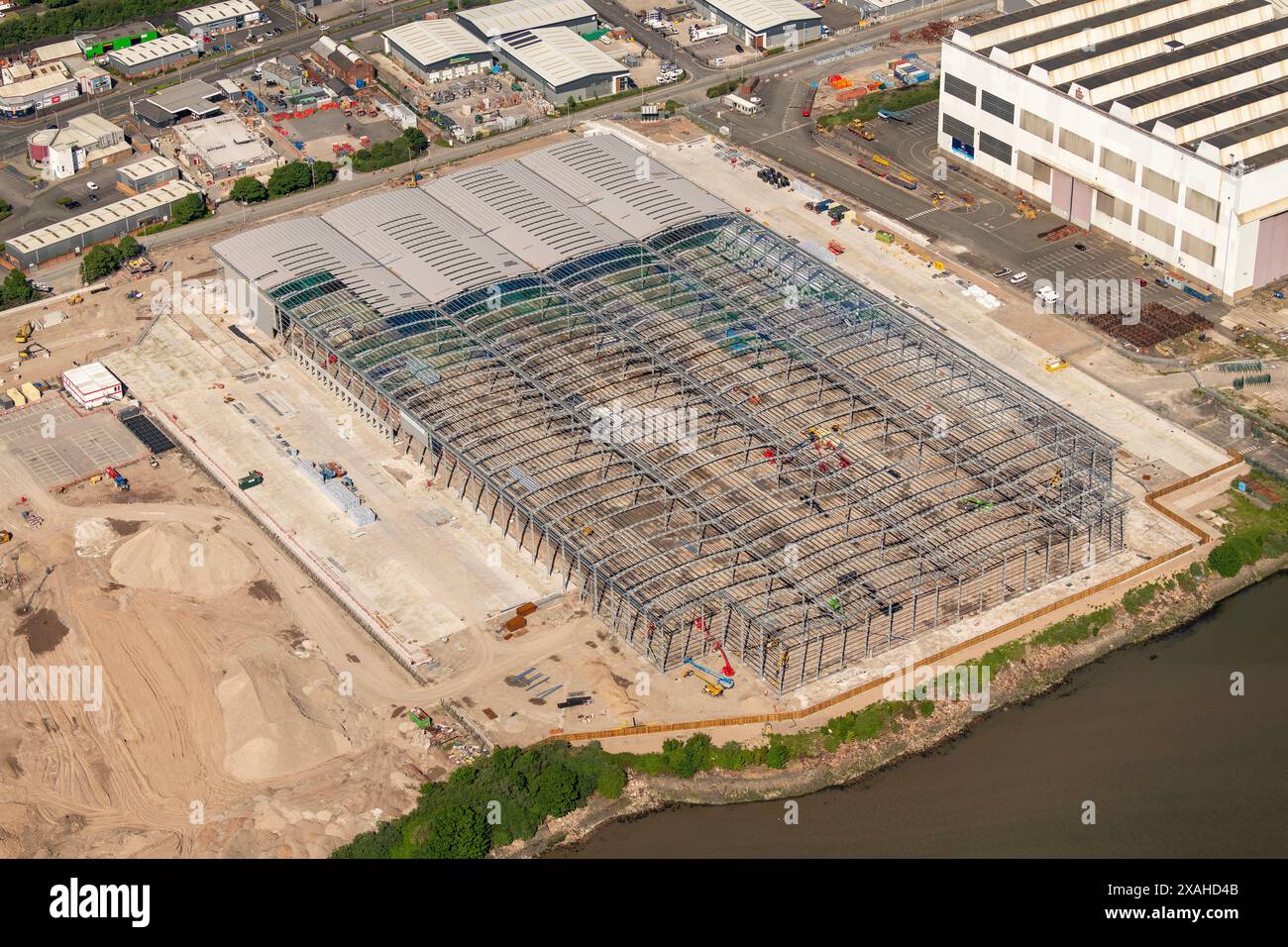 Aerial photograph of new commercial steel frame building being erected ...