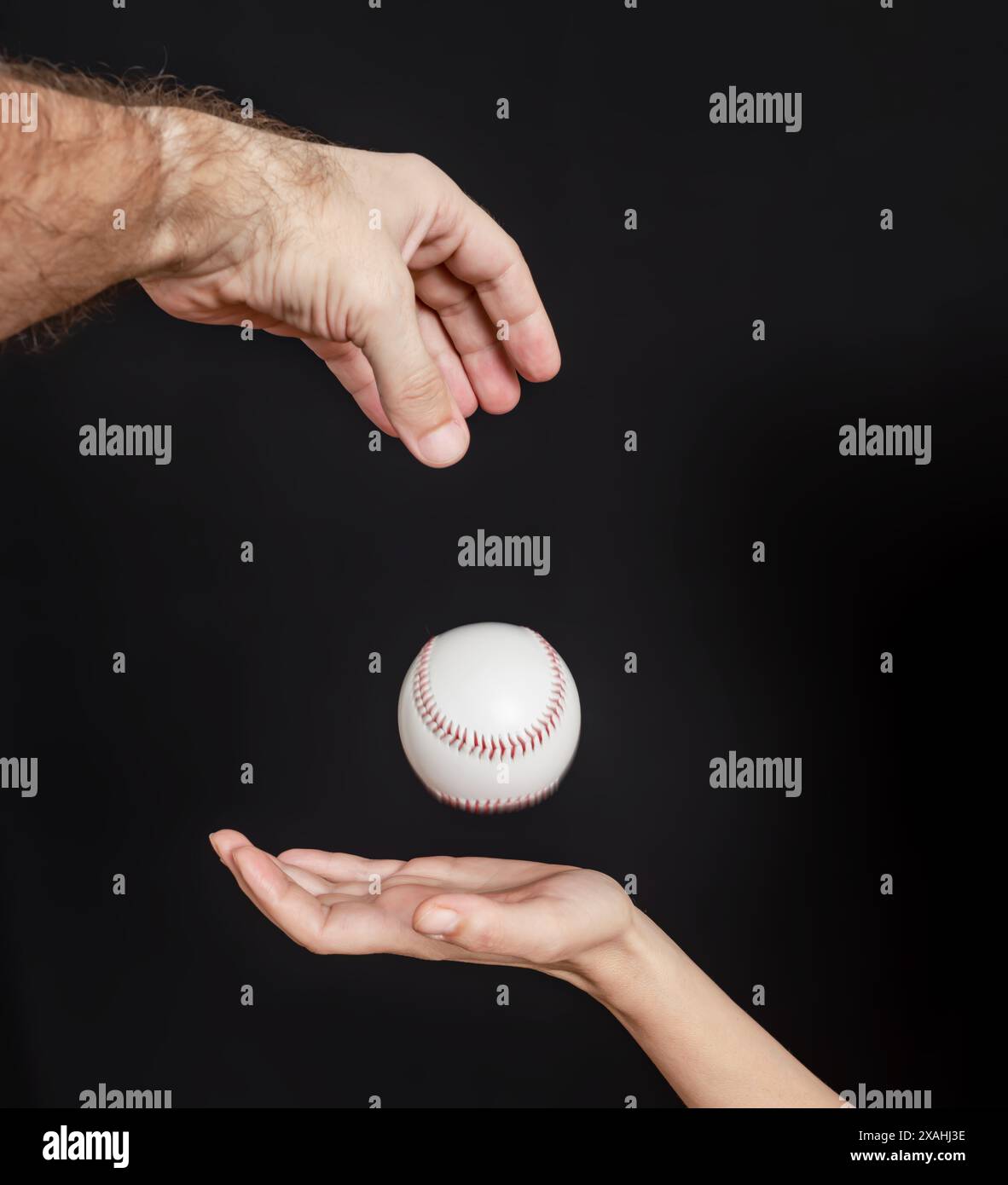 Hand catching a ball hi-res stock photography and images - Alamy