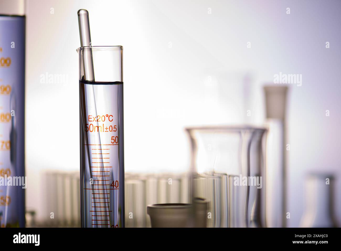 Close up of test-tube glass beaker with liquid standing on a laboratory ...
