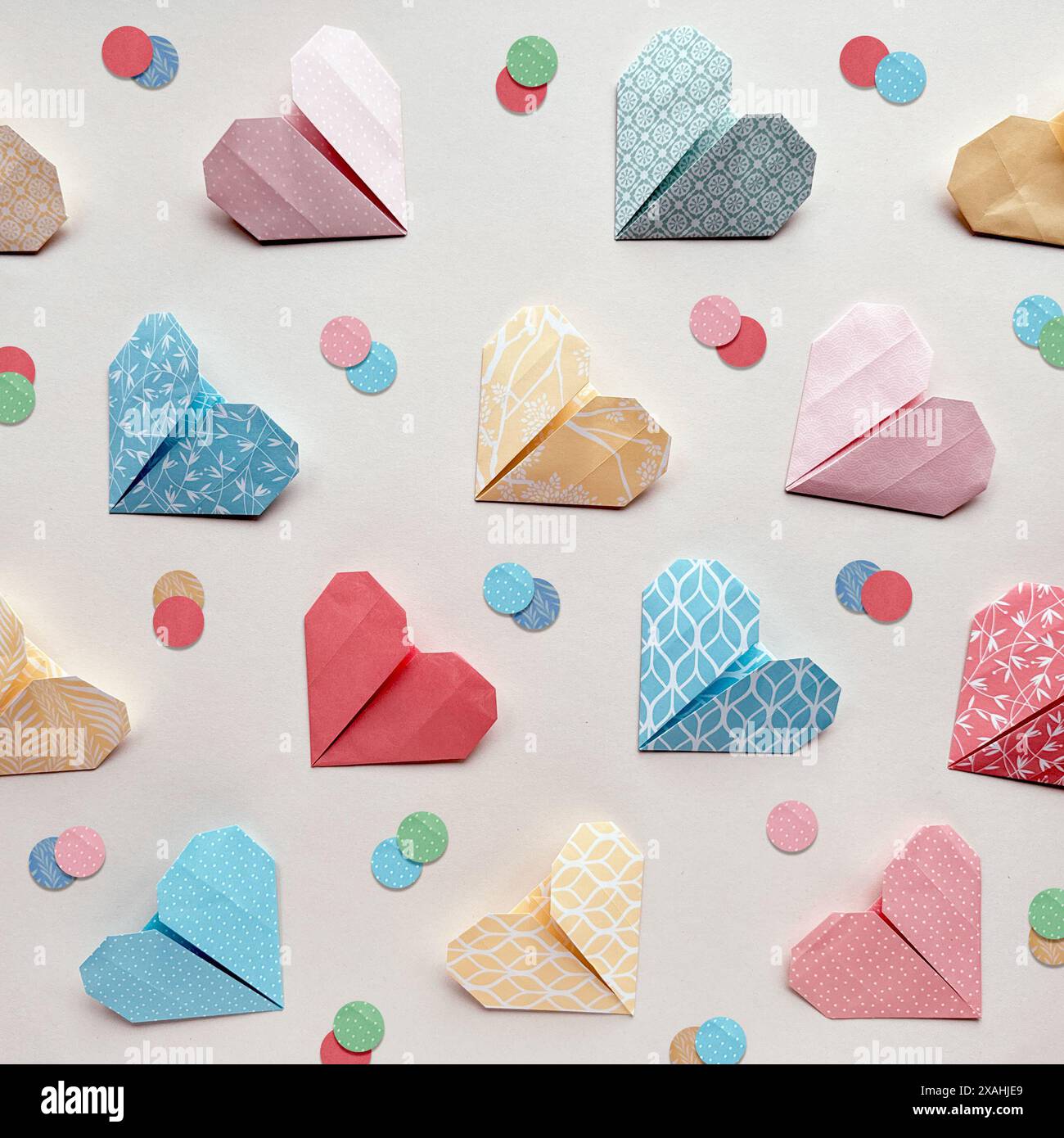 Colorful Origami Hearts Pattern on Light Background for Creative ...