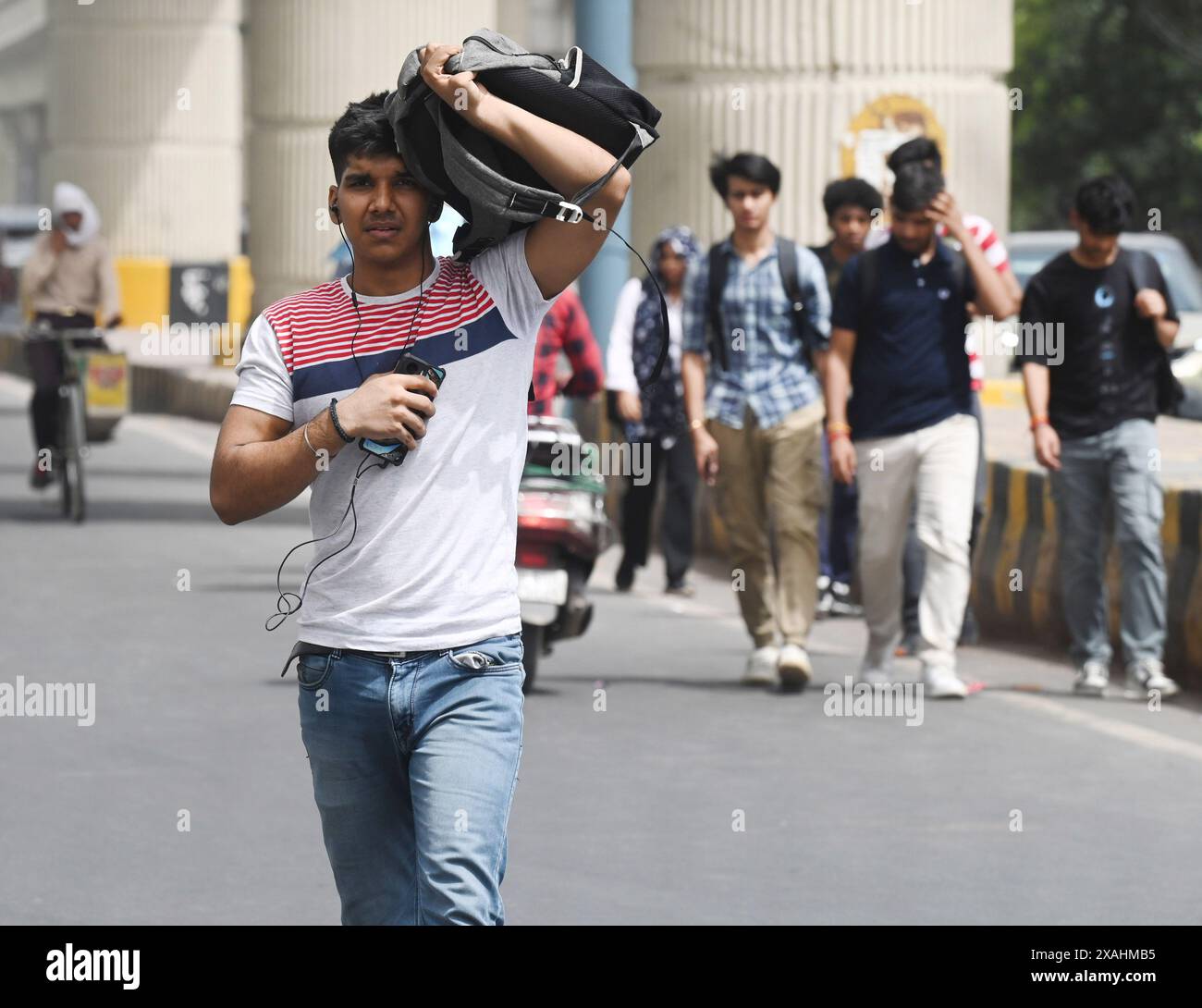 NOIDA, INDIA - JUNE 5: Visitors brave the heat Wave during a hot summer ...