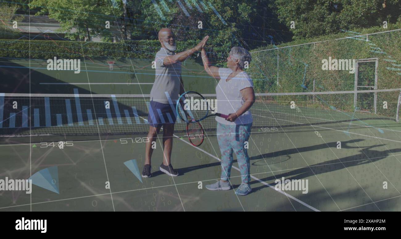 Data processing against african american senior couple high fiving each other at tennis court ...