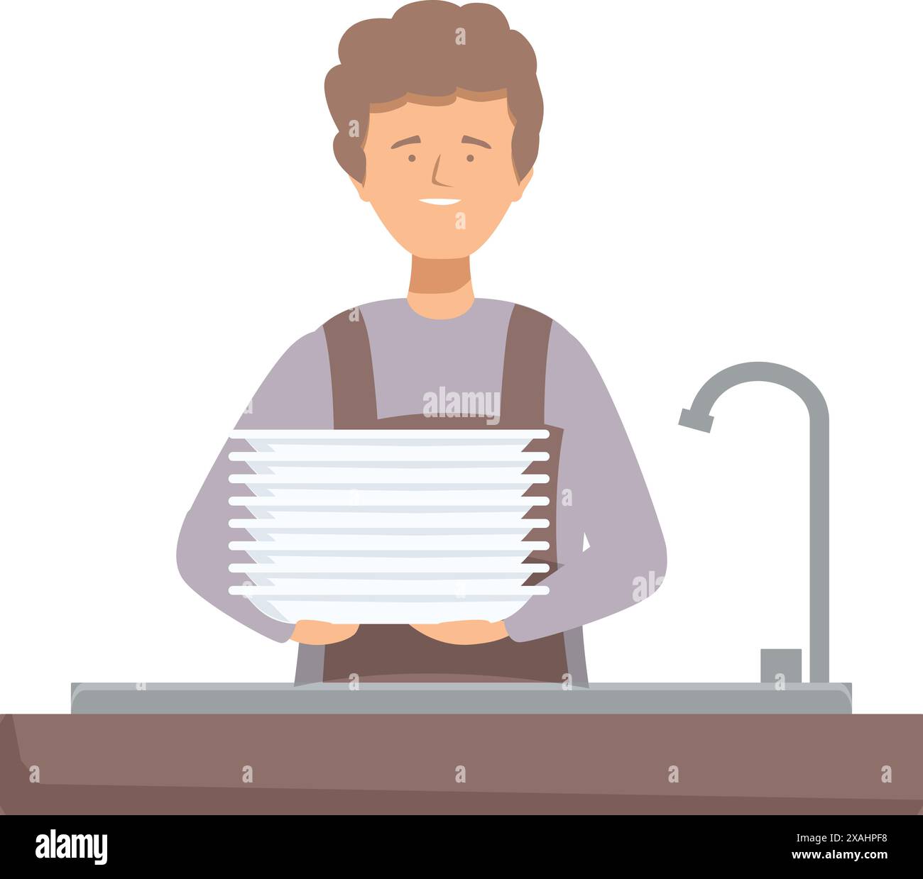 Male dishwasher wearing apron holding a stack of clean plates in a ...