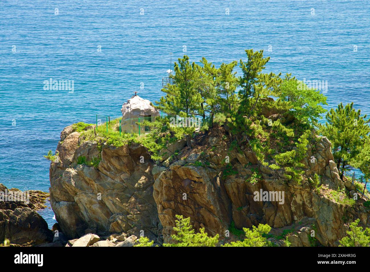 Samcheok City, South Korea - May 18th, 2024: A rocky cliffside adorned ...