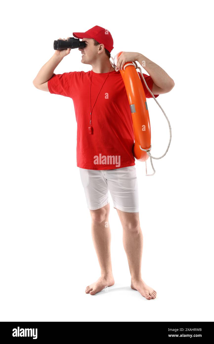 Male lifeguard with ring buoy looking through binoculars on white ...