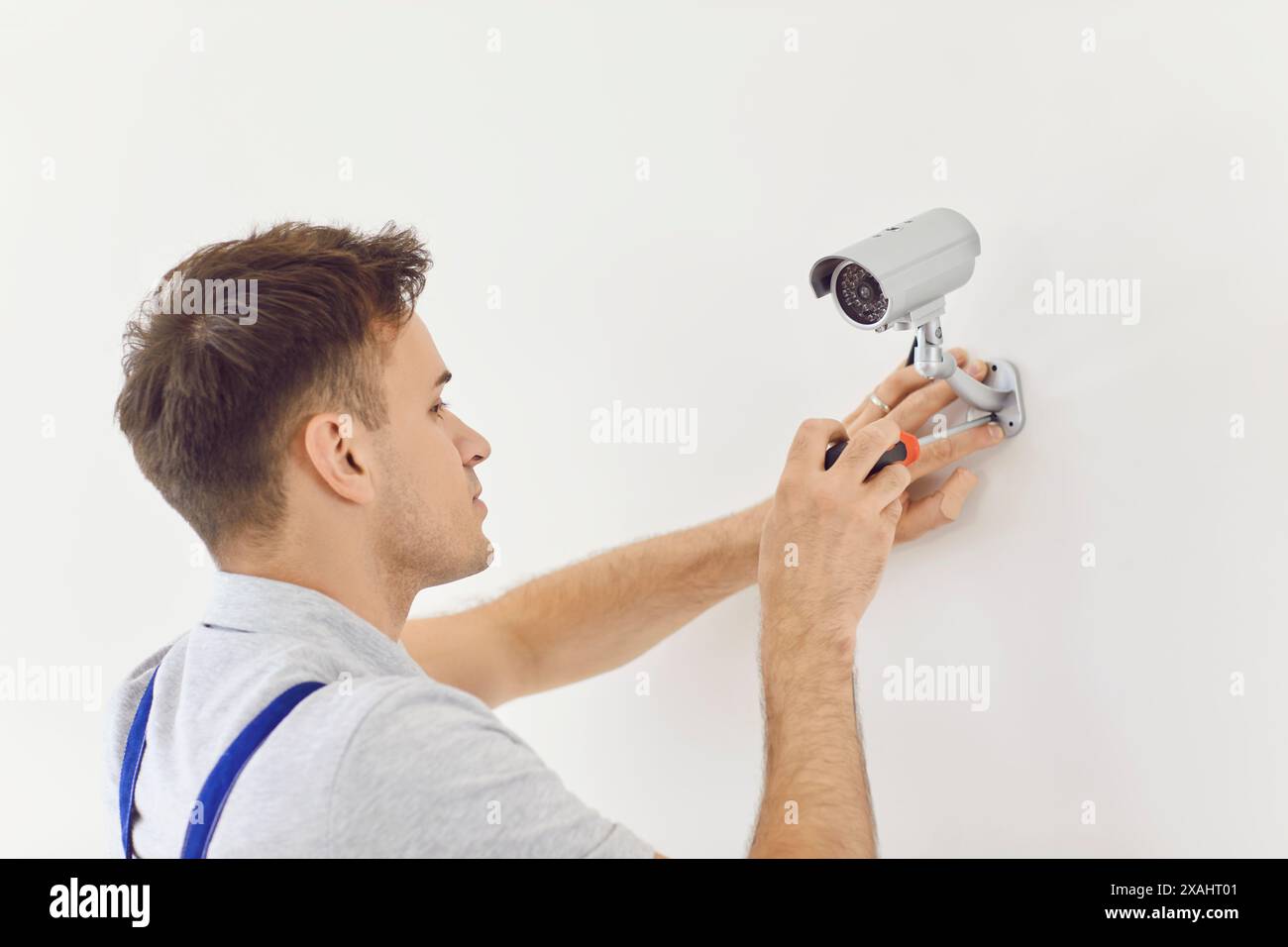 Technician Installing CCTV Surveillance Camera in Home or Office Stock ...