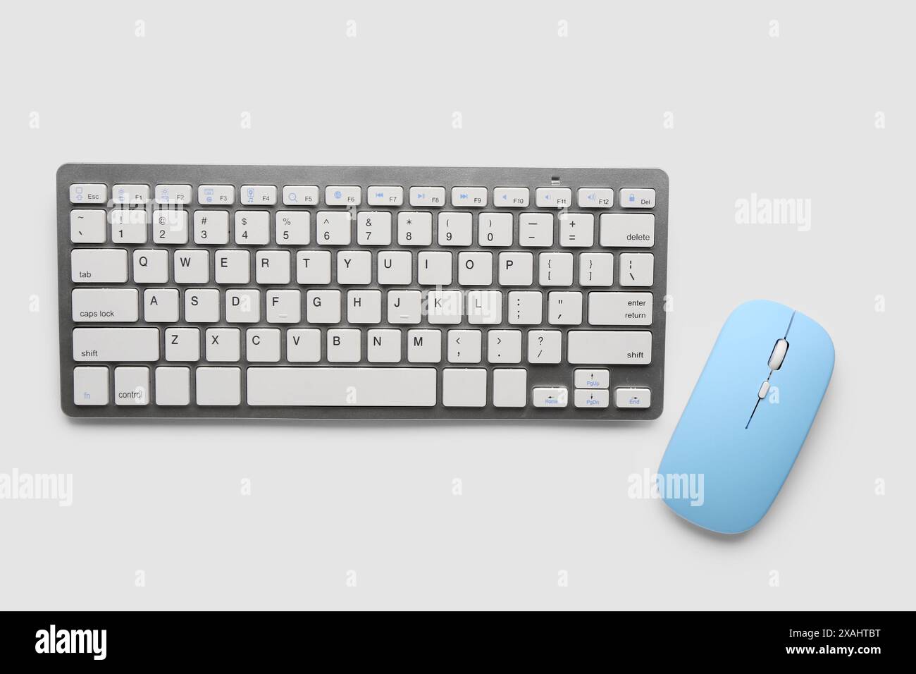 Computer mouse and keyboard on white background Stock Photo - Alamy