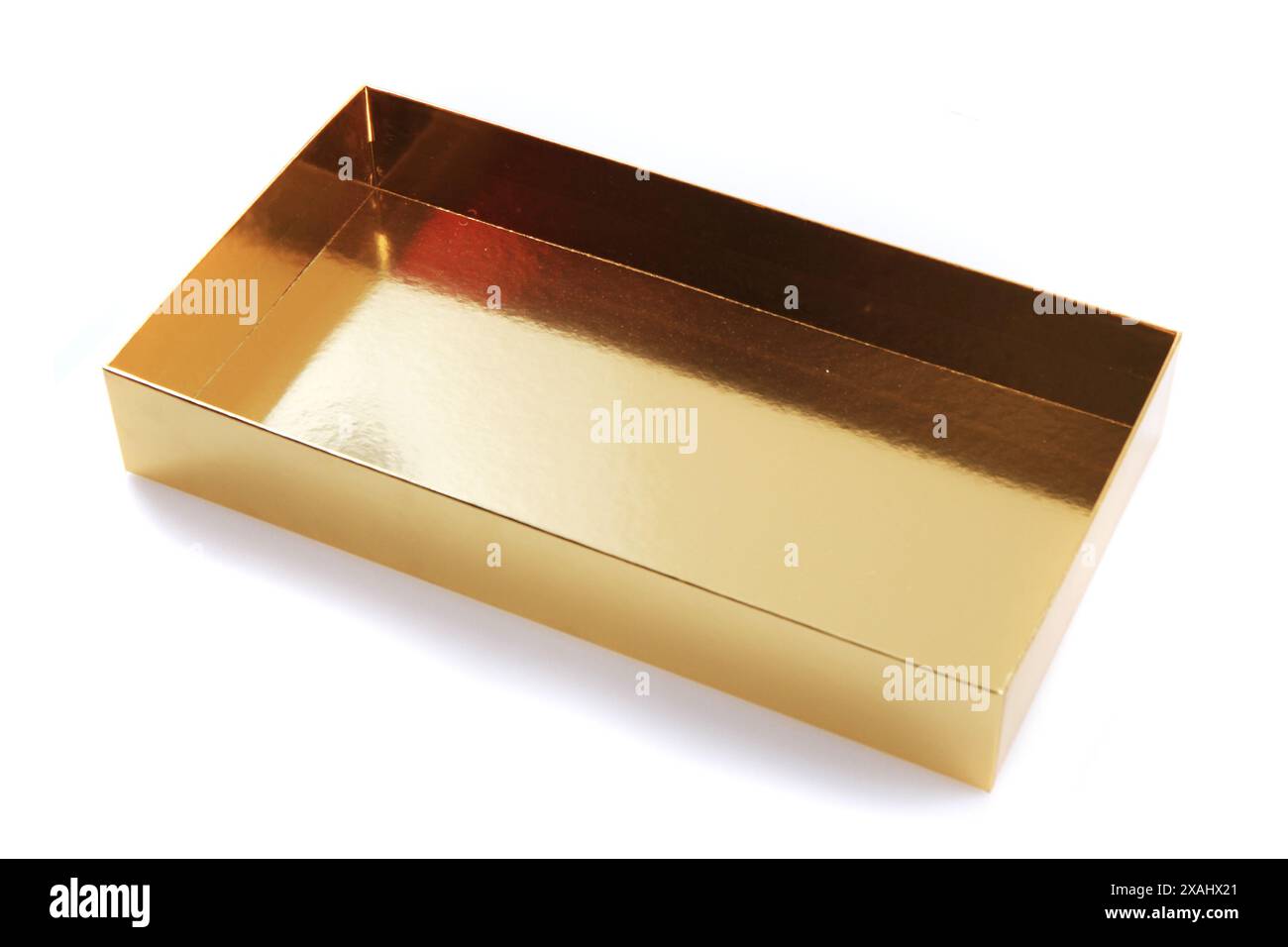 big golden box isolated on the white background Stock Photo - Alamy