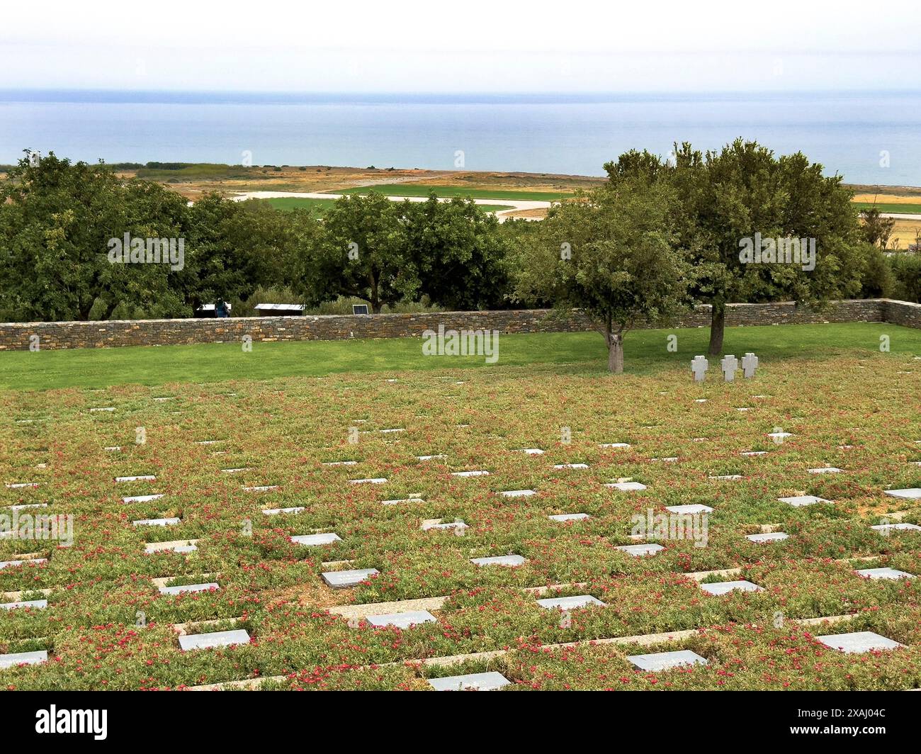 View over rows of graves with gravestones Grave slabs on part of German military cemetery ...
