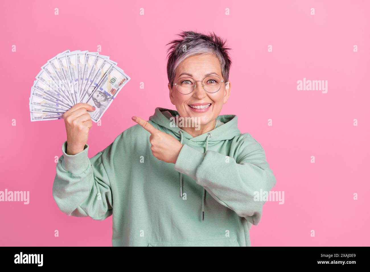 Photo of positive funky lady dressed khaki sweatshirt pointing finger ...