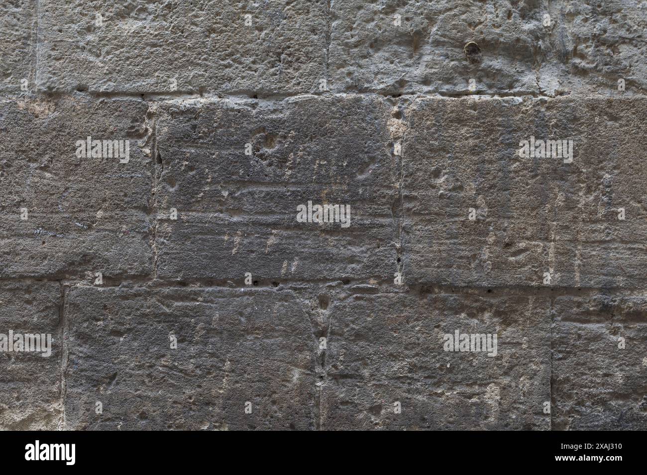close-up flat photography of an old grey stone brick wall surface ...
