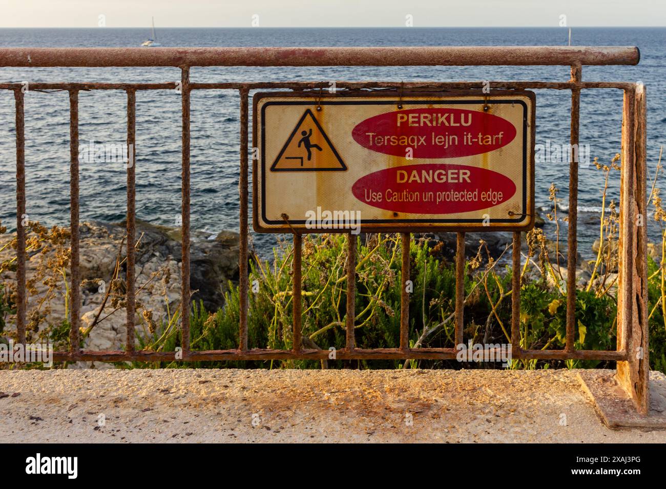 rusty warning sign Stock Photo - Alamy