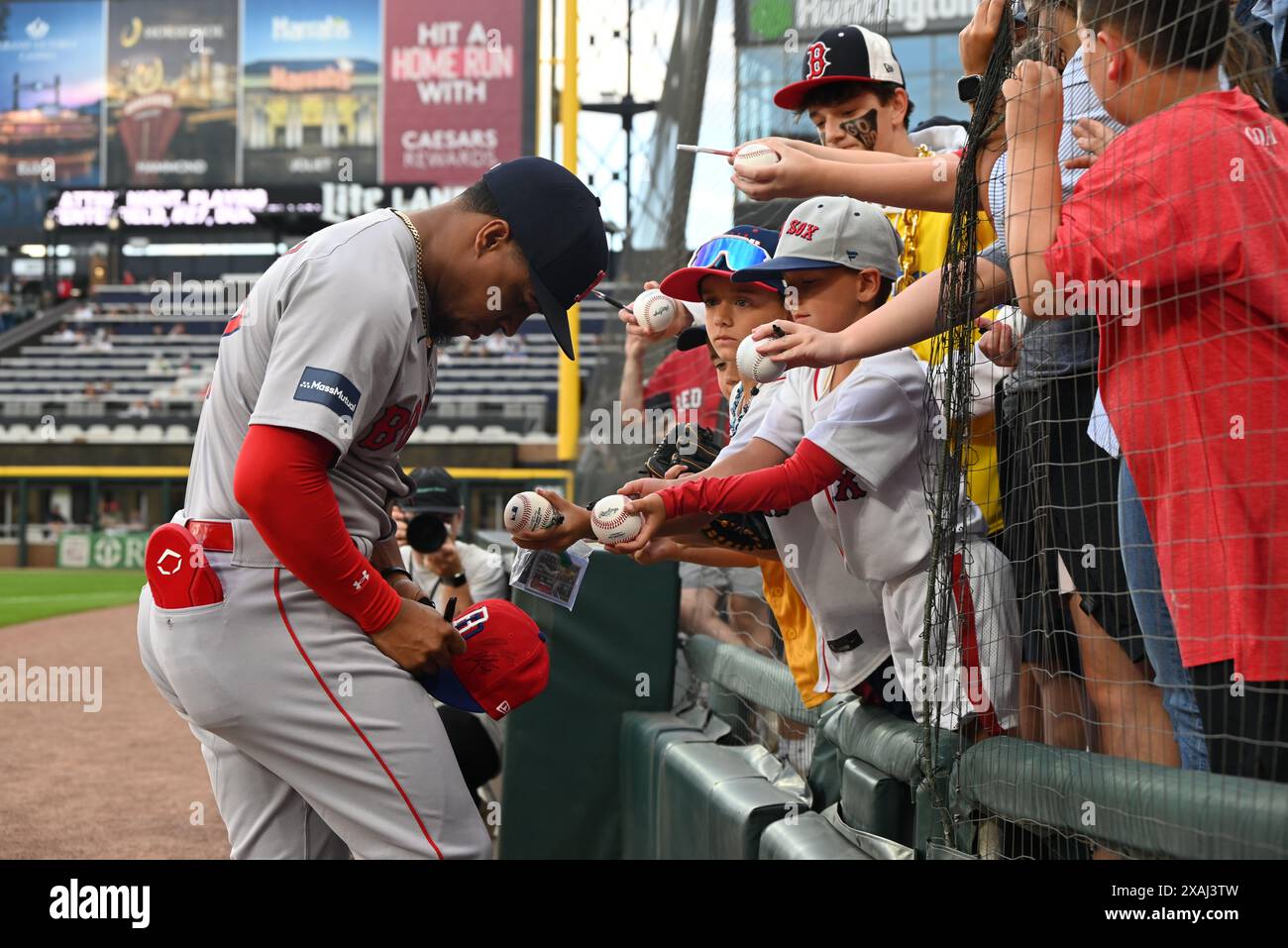 Emmanuel Valdez, #47 of the Boston Red Sox signs autographs from fans ...