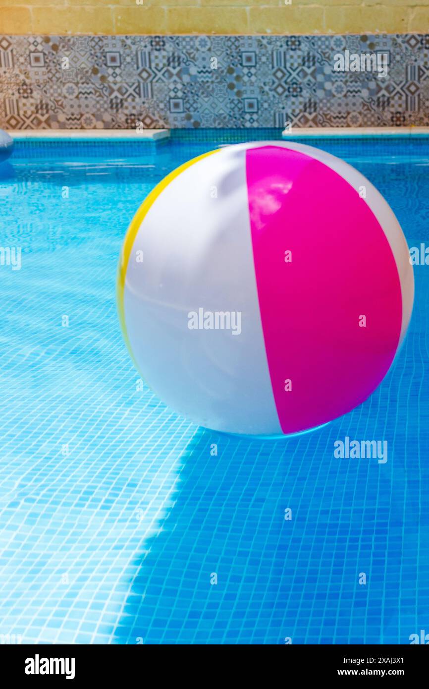 inflatable ball in the pool Stock Photo - Alamy