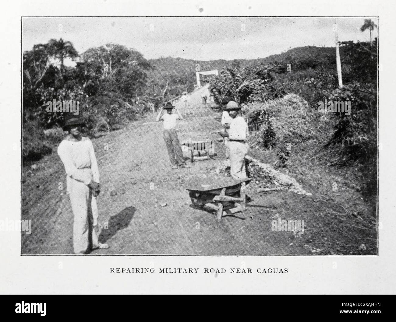 REPAIRING MILITARY ROAD NEAR CAGUAS from the Article THE ENGINEERING ...