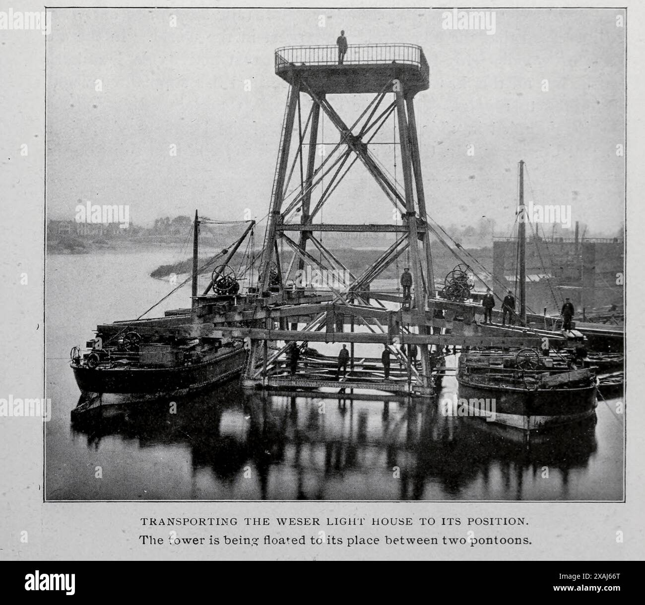 TRANSPORTING THE WESER LIGHT HOUSE TO ITS POSITION. The tower is being ...