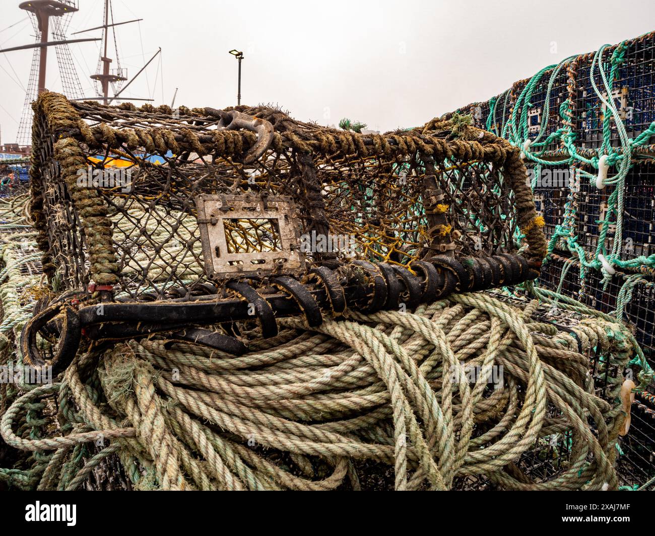 A lobster pot sat on top of a rope bundle in the marina at Whitby ...