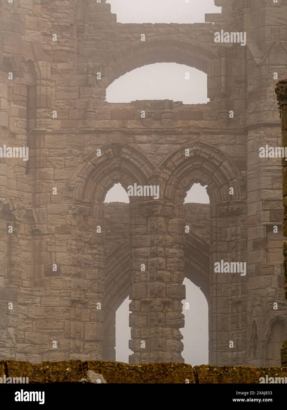 Thick sea Fog surrounds the ruins of Whitby Abbey, creating a haunting ...