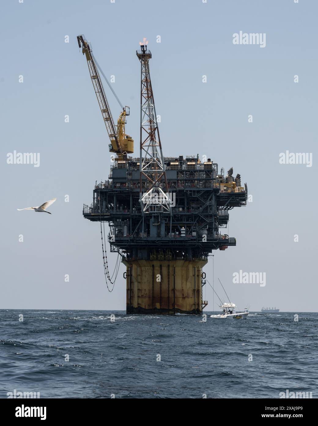 A large offshore floating oil platform operates in the Gulf of Mexico ...