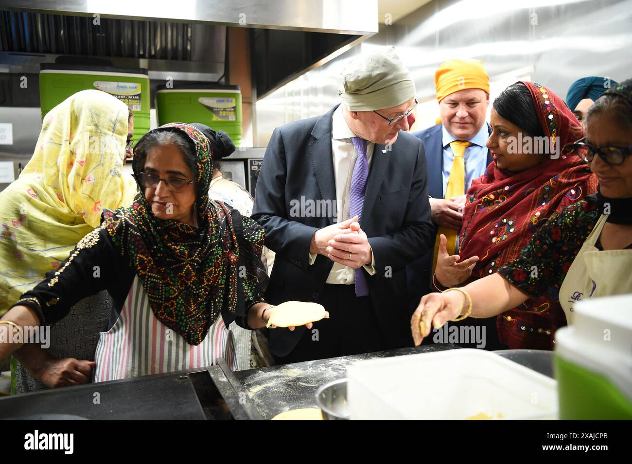 SNP leader John Swinney, with parliamentary candidate Chris Stephens ...