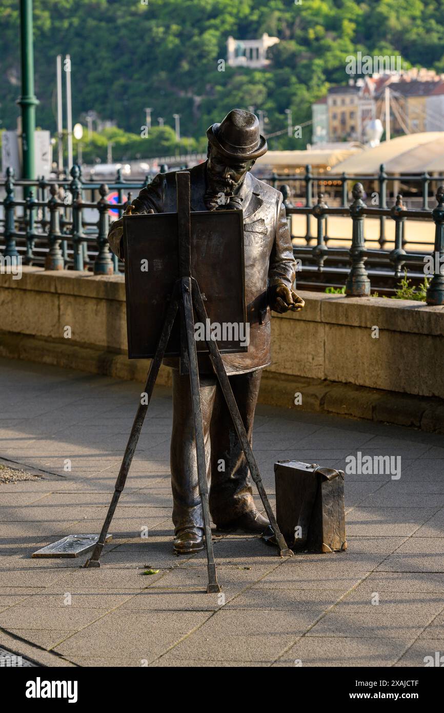 Statue of the artist Roskovics Ignac on the banks of the river Danube ...