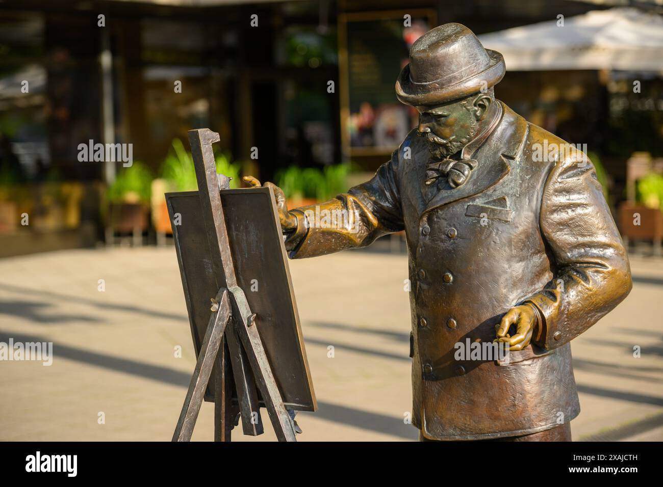 Statue of the artist Roskovics Ignac on the banks of the river Danube ...