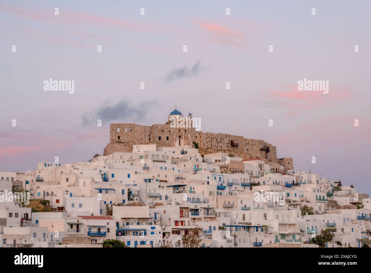 A picturesque view of a beautiful Greek village with white-washed ...