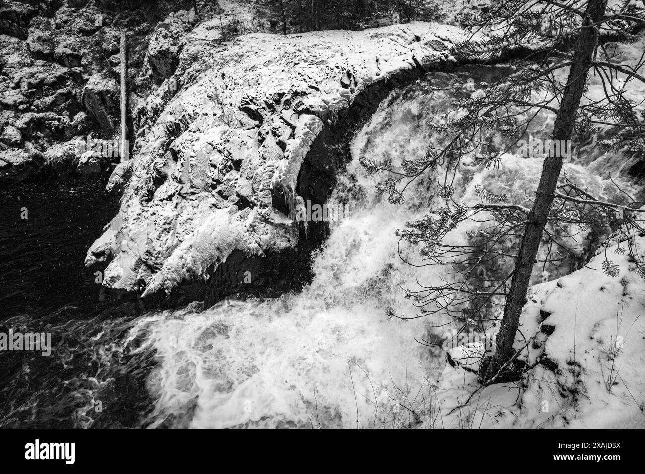 Cascade waterfall winter landscape, black and white photo. Kivach Falls ...
