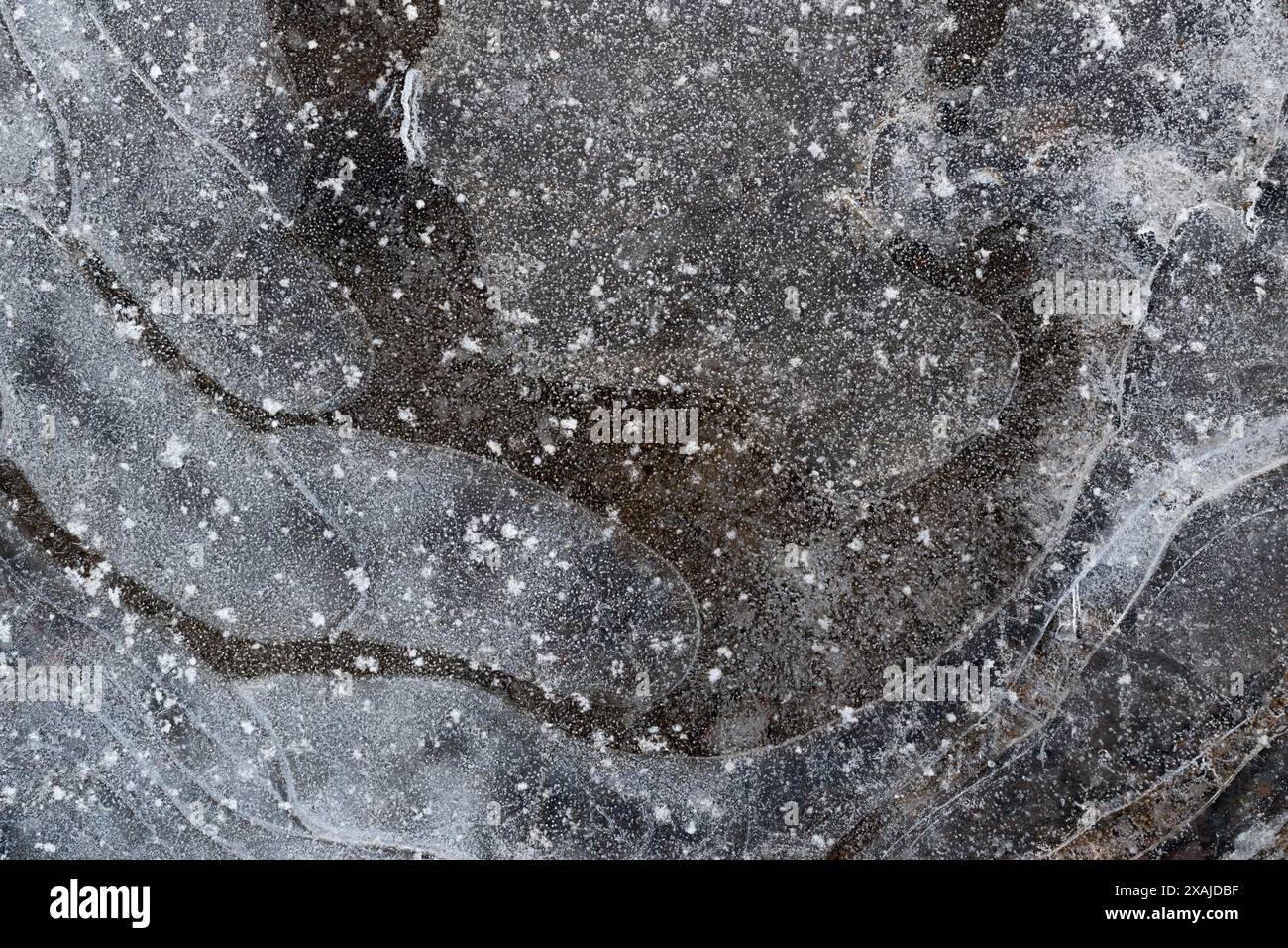 Frozen puddle close up, ice texture and patterns, cold temperature Stock Photo - Alamy