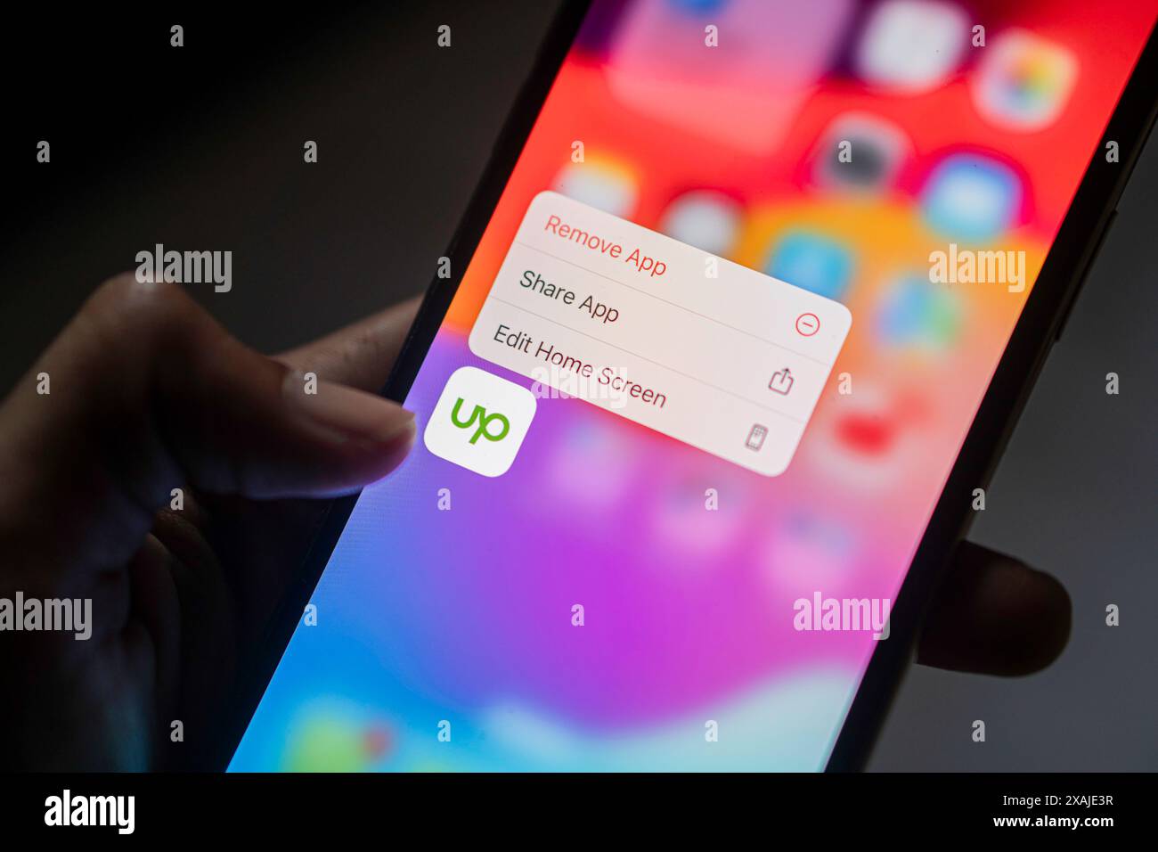 A close-up of a smart phone screen showing app management options ...