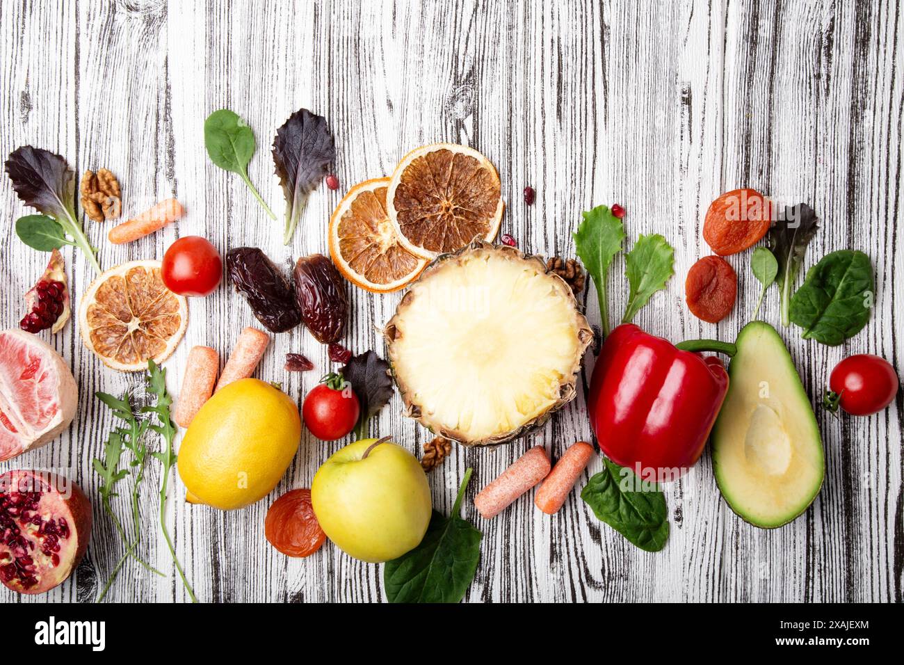 Essentials of healthy diet featuring Fruits, Vegetables, and Nuts Stock Photo - Alamy