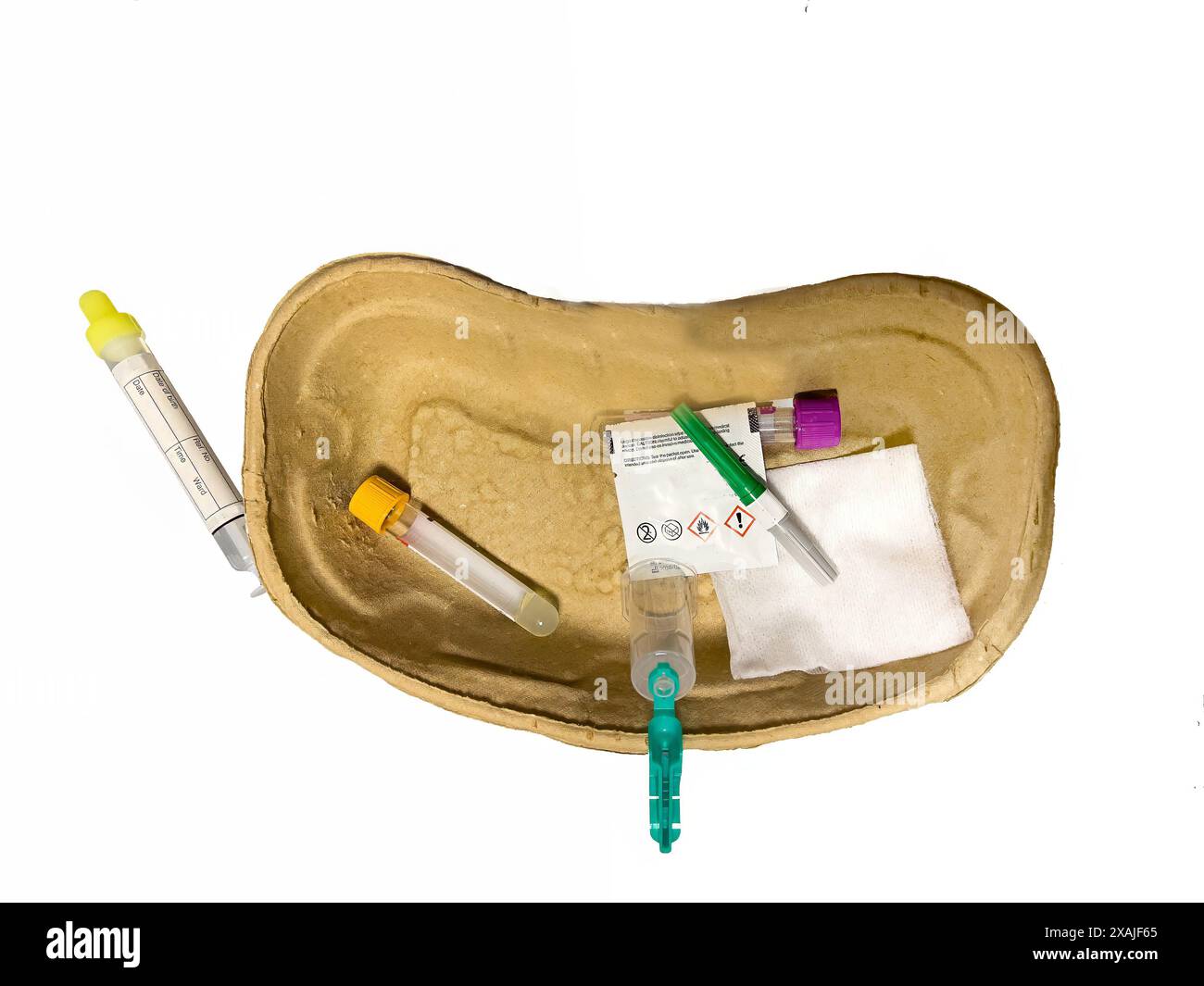 Cardboard medical kidney dish with syringes medical wipes and specimen ...