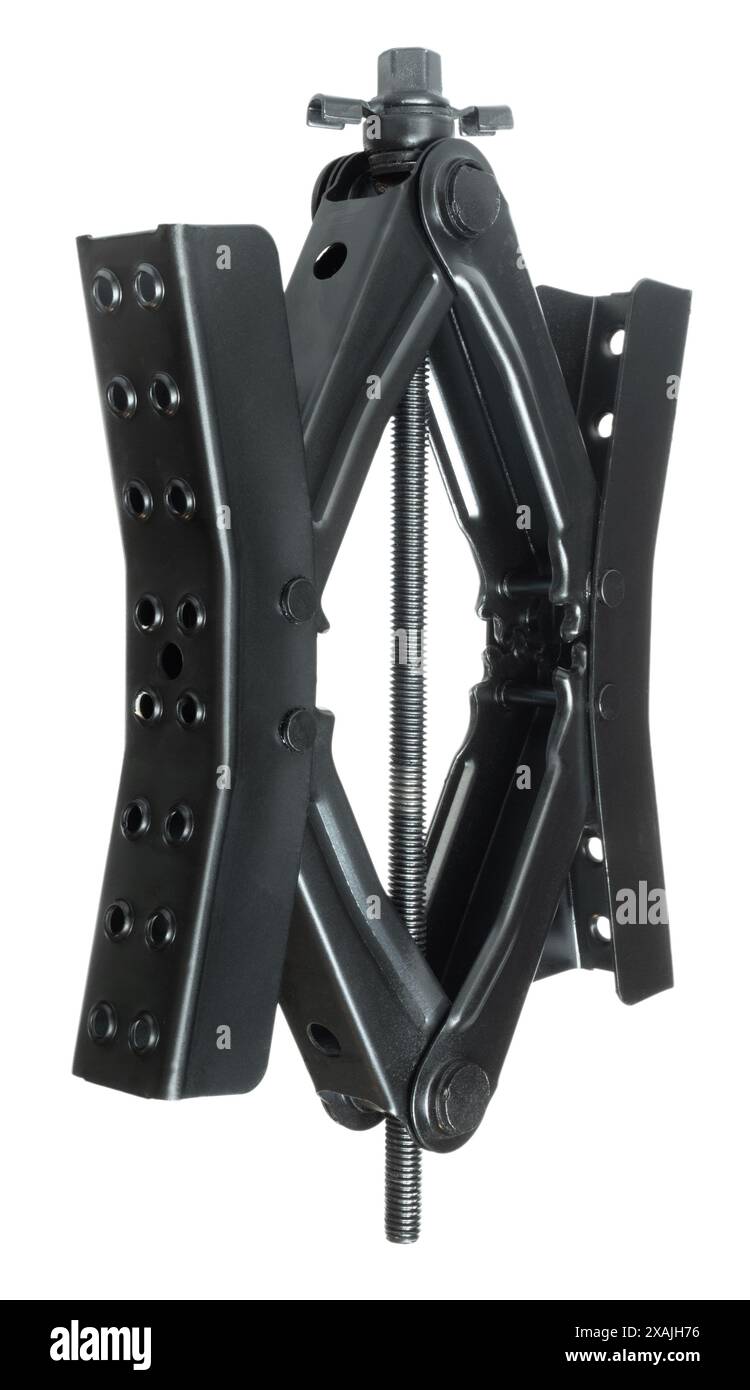 Scissors chock that expands in an X shape between the tired of an RV ...