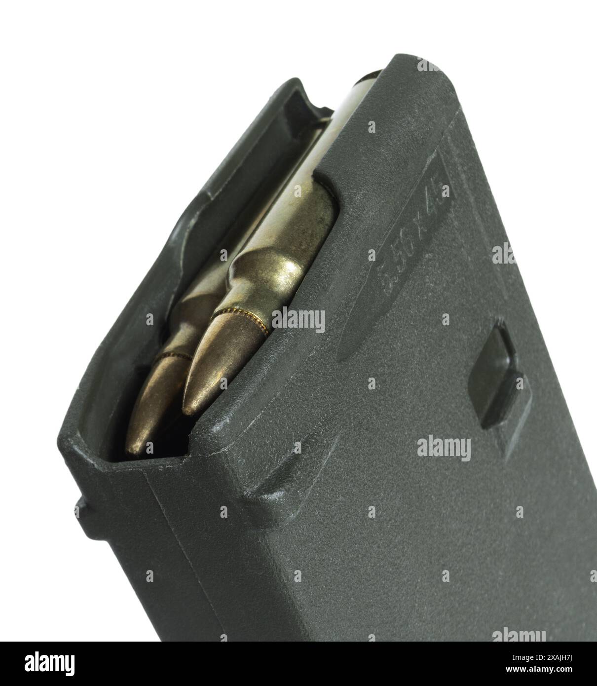 AR-15 polymer magazine loaded with 30 cartridges isolated in a studio ...