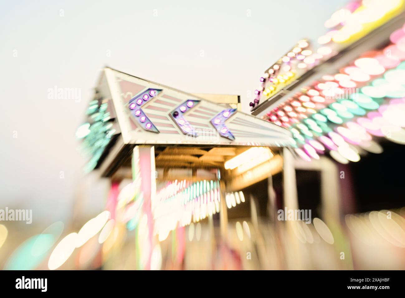 Blurred colorful carnival lights at night, creating a vibrant an Stock ...