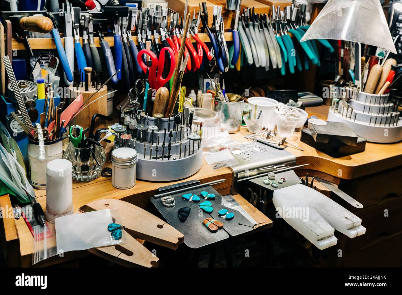 Jewelry makers bench with jewelry making tools and equipment Stock ...