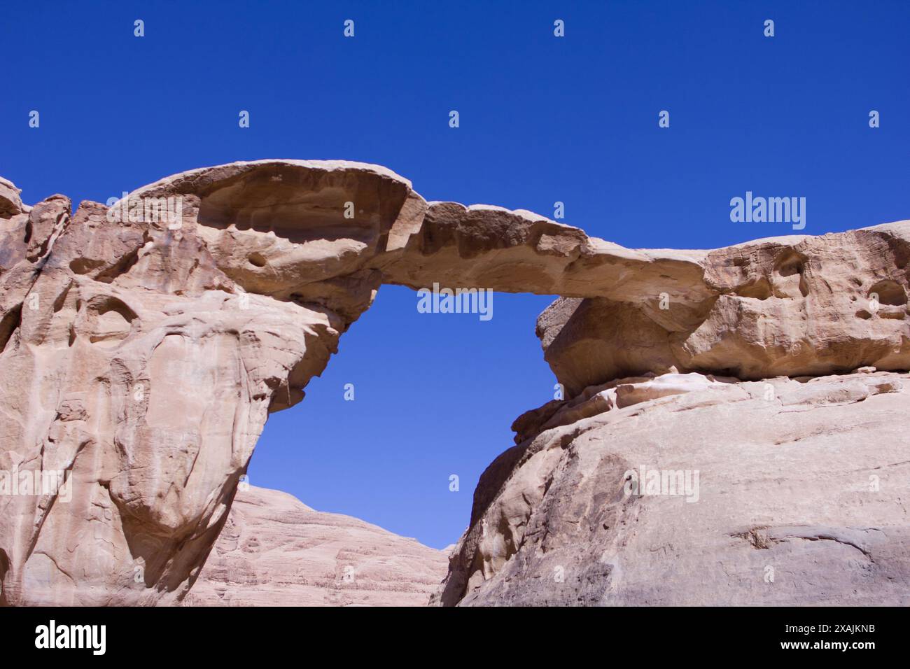 Desert rock formations in the middle east with sand and sky Stock Photo ...