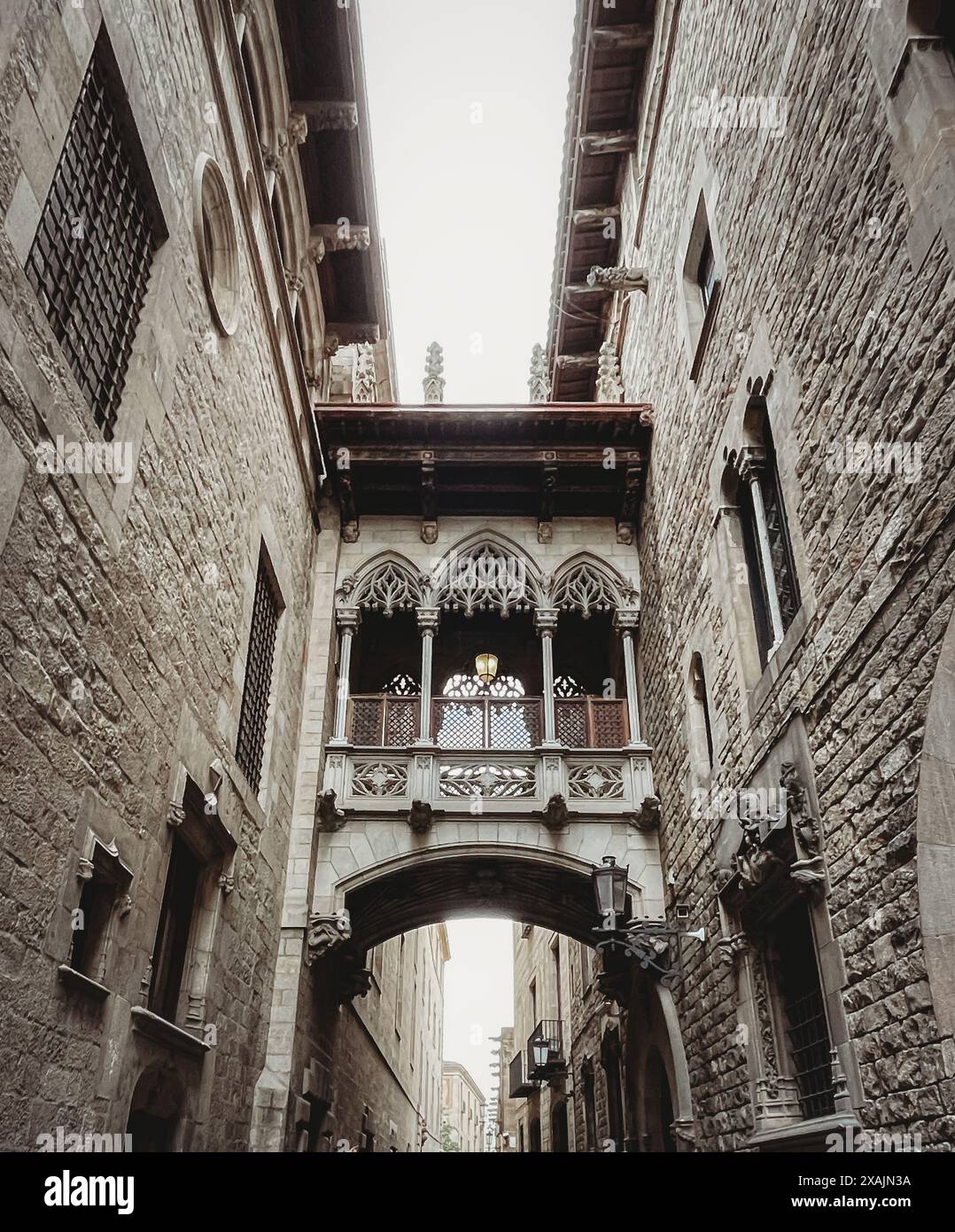 Stone Pont Del Bisbe, Bishop's Bridge in gothic quarter of Barcelona ...