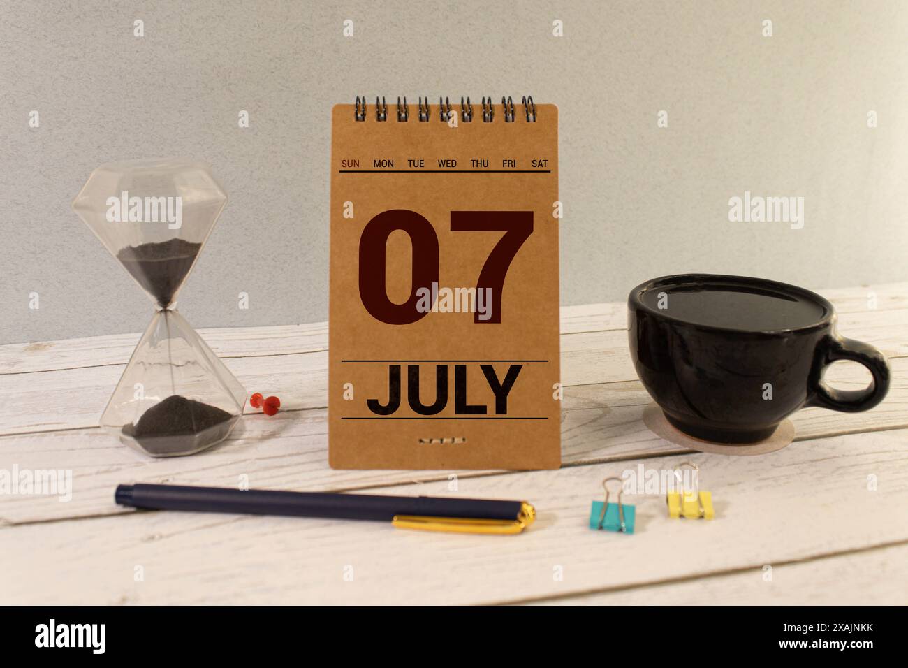 July 7, a calendar photo from the wood The table top consists of a book ...