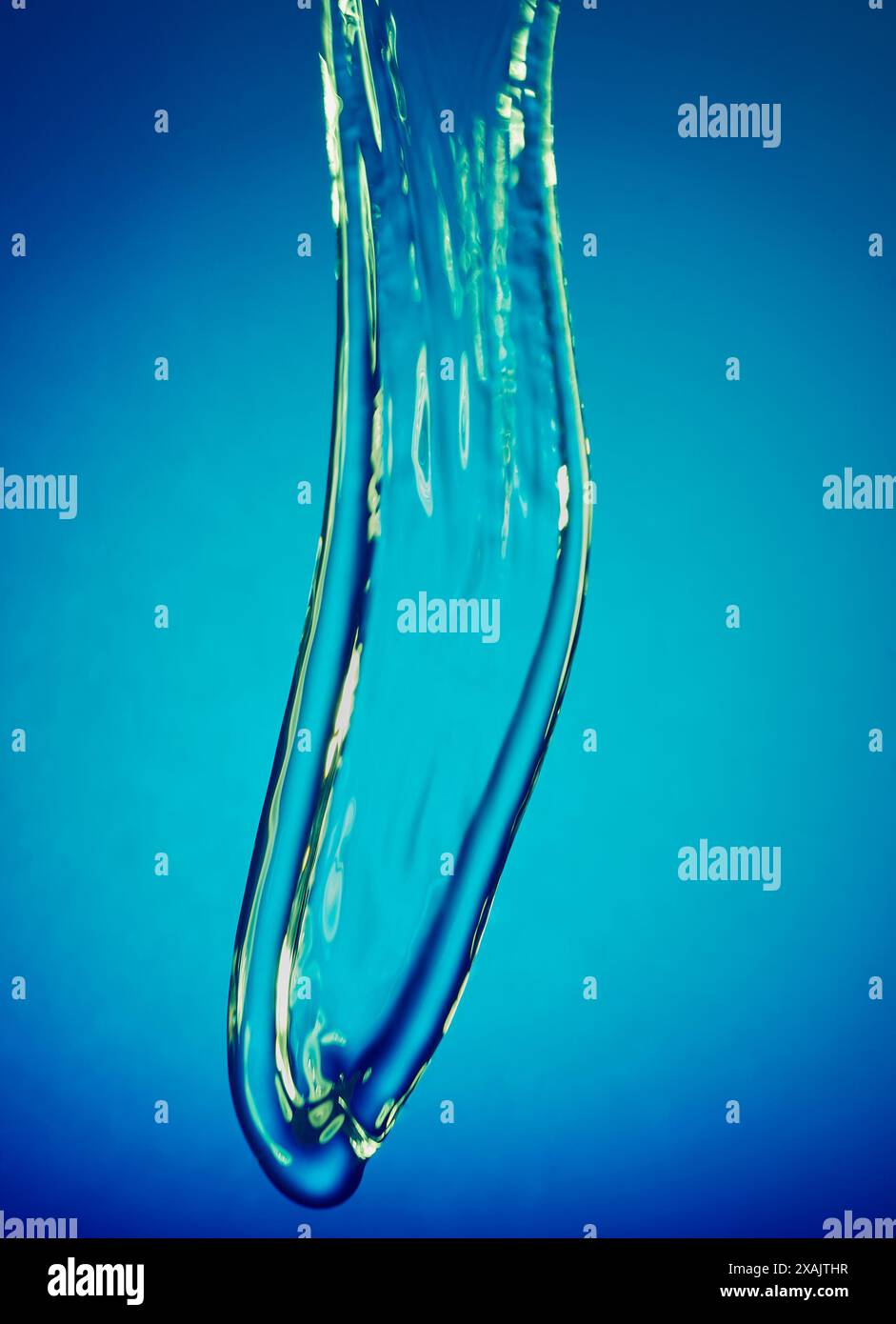 Cool water splash on a blue gradient background Stock Photo - Alamy