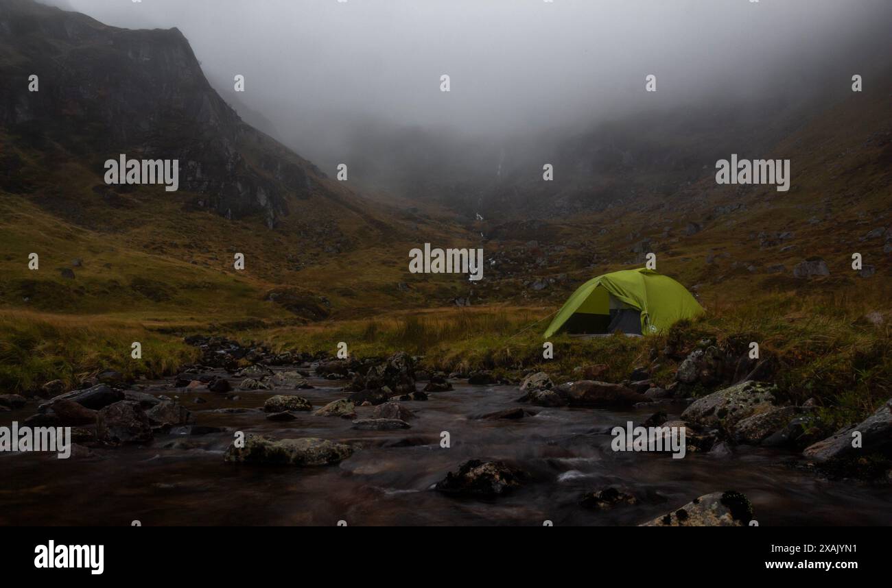 Image of a green camping tent next to a river in Corrie Fee, Cairngorms ...