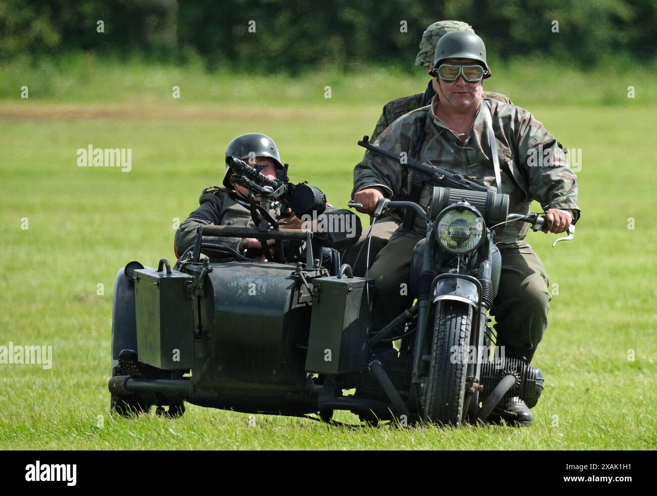 Enactors on German world war two motorcycle combination fitted with ...