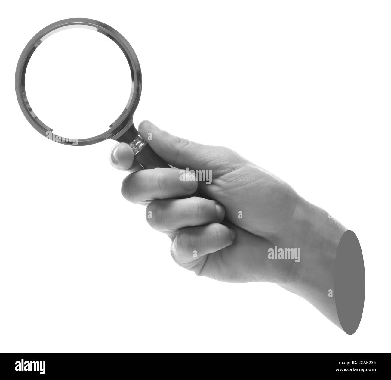 Woman's hand with magnifying glass on white background. Black and white ...