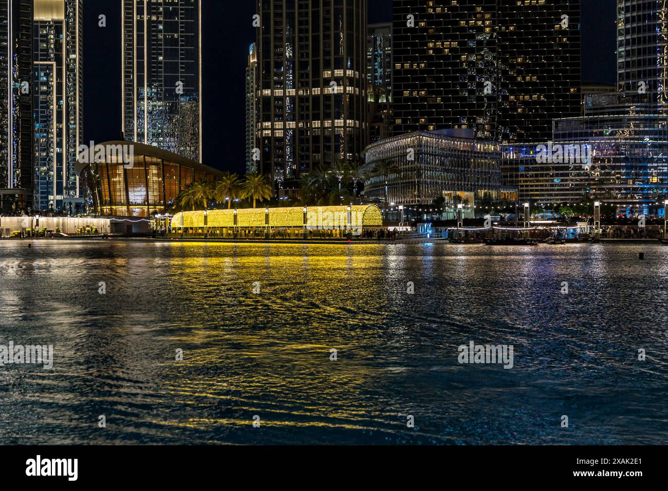 Dubai Opera at Burj Khalifa Lake, Dubai Fountain, Dubai Mall, twilight ...