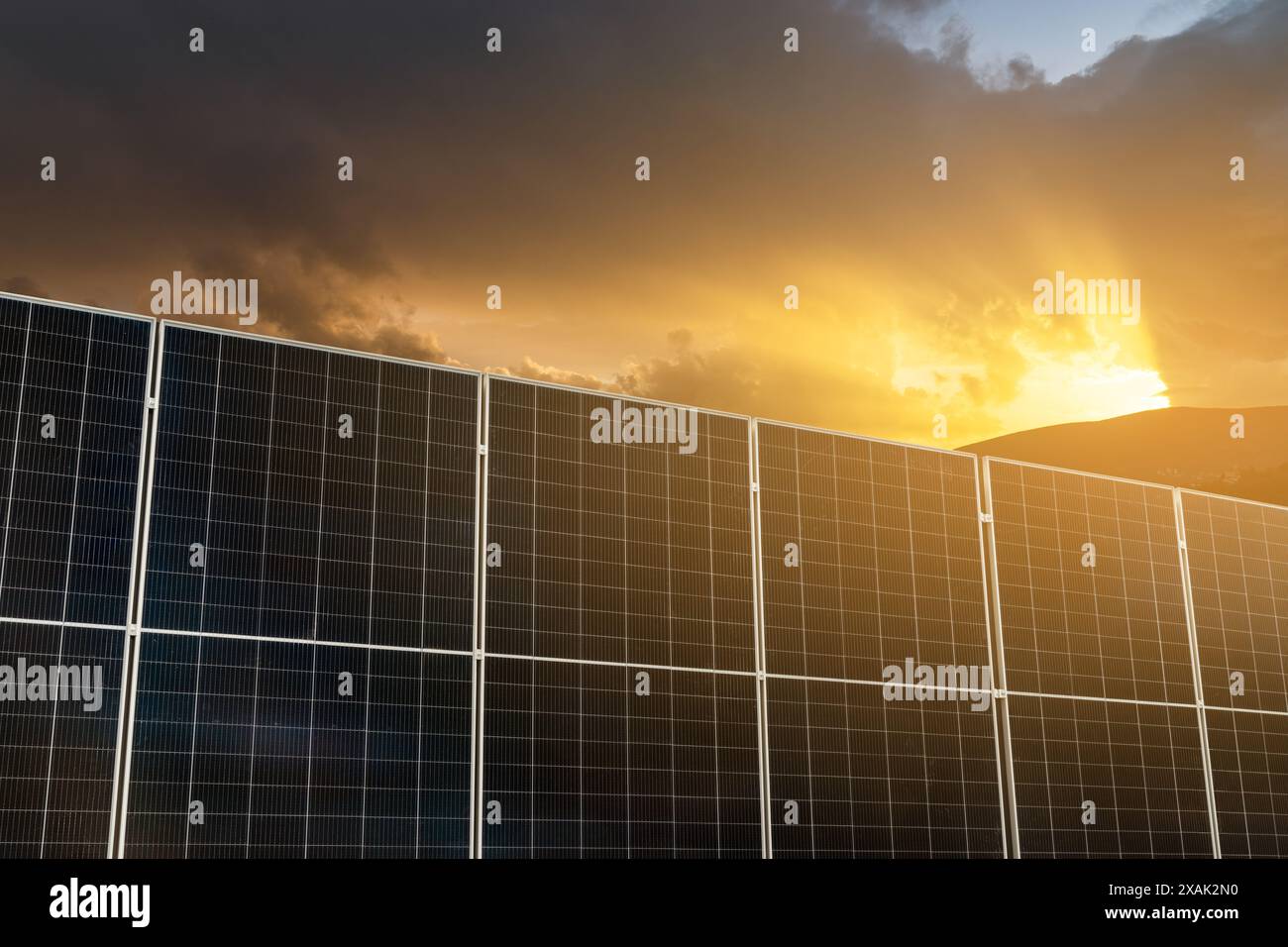 Solar panels on a background of dramatic sunset sky Stock Photo - Alamy